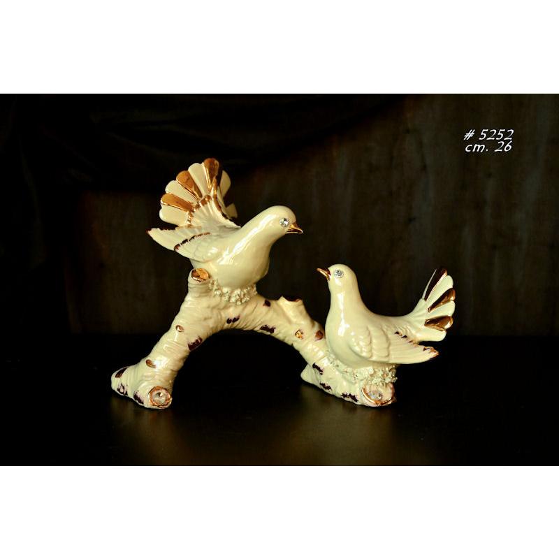 Beautiful doves figurines made of ceramic