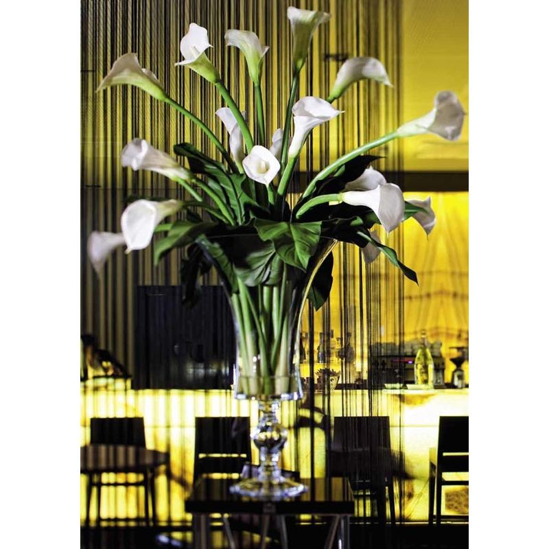 Elegant glass vase with floral arrangement