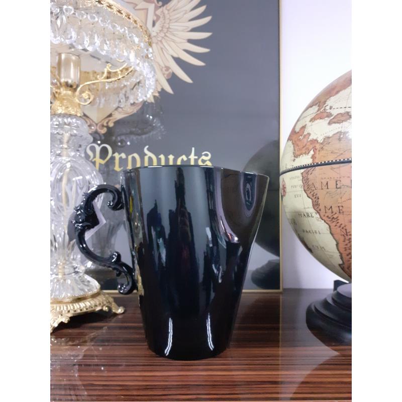 Classic big jug with the handle on stylish tables